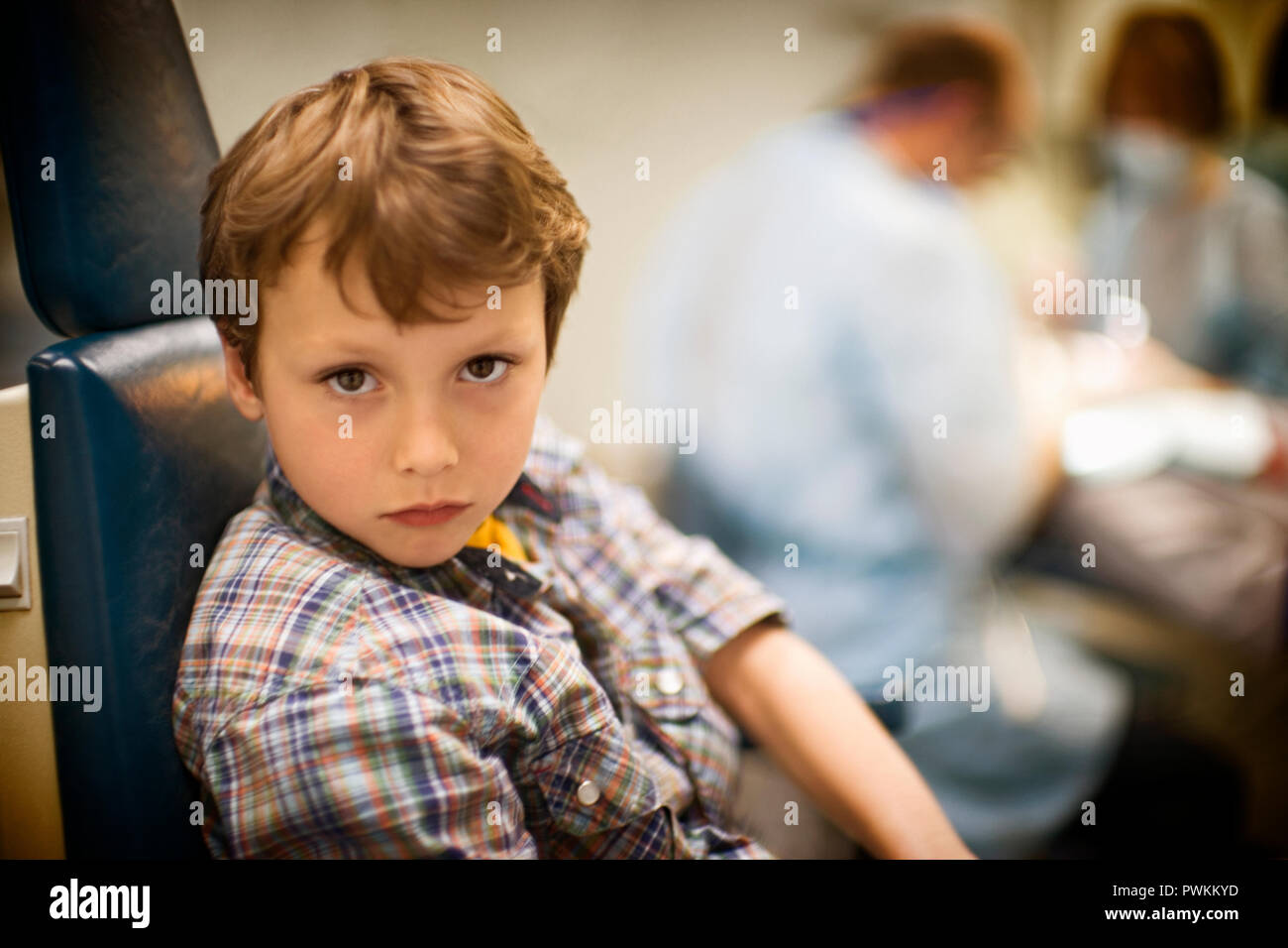 Boy child children boys young waiting sitting hi-res stock photography ...