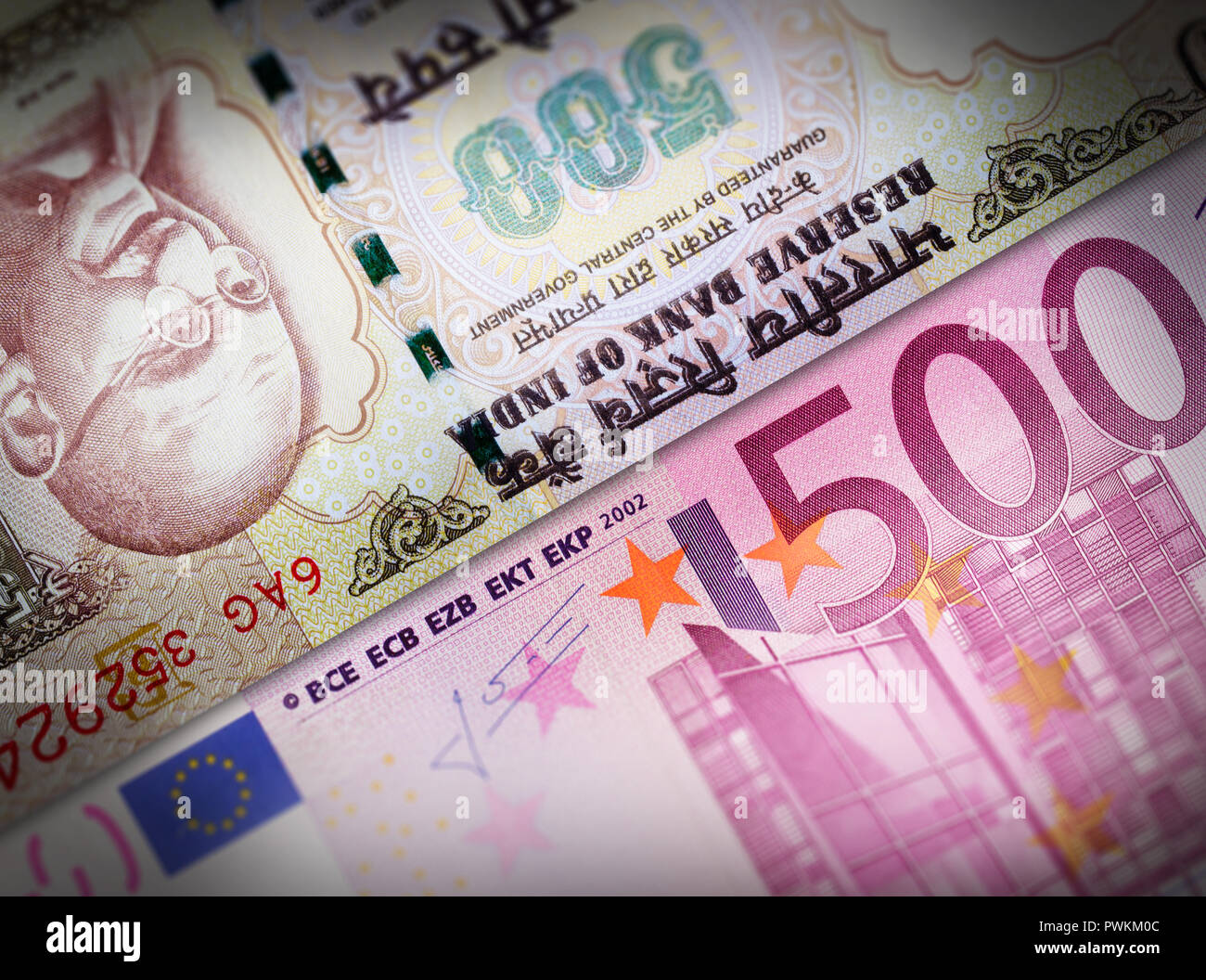 Two money bills aligned and setup next to each other symbolizing ...