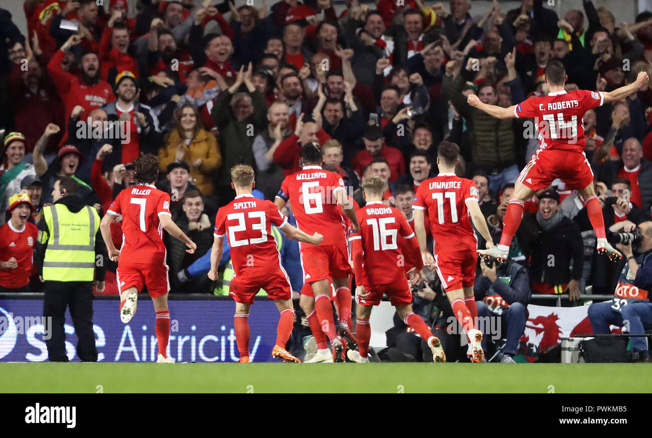 Wales' Harry Wilson (hidden) celebrates scoring his side's first goal ...