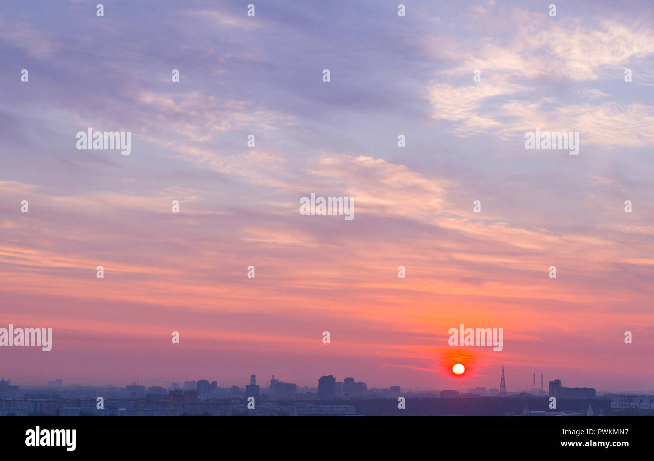 sunrise sky over the city at cold summer morning. background, nature ...