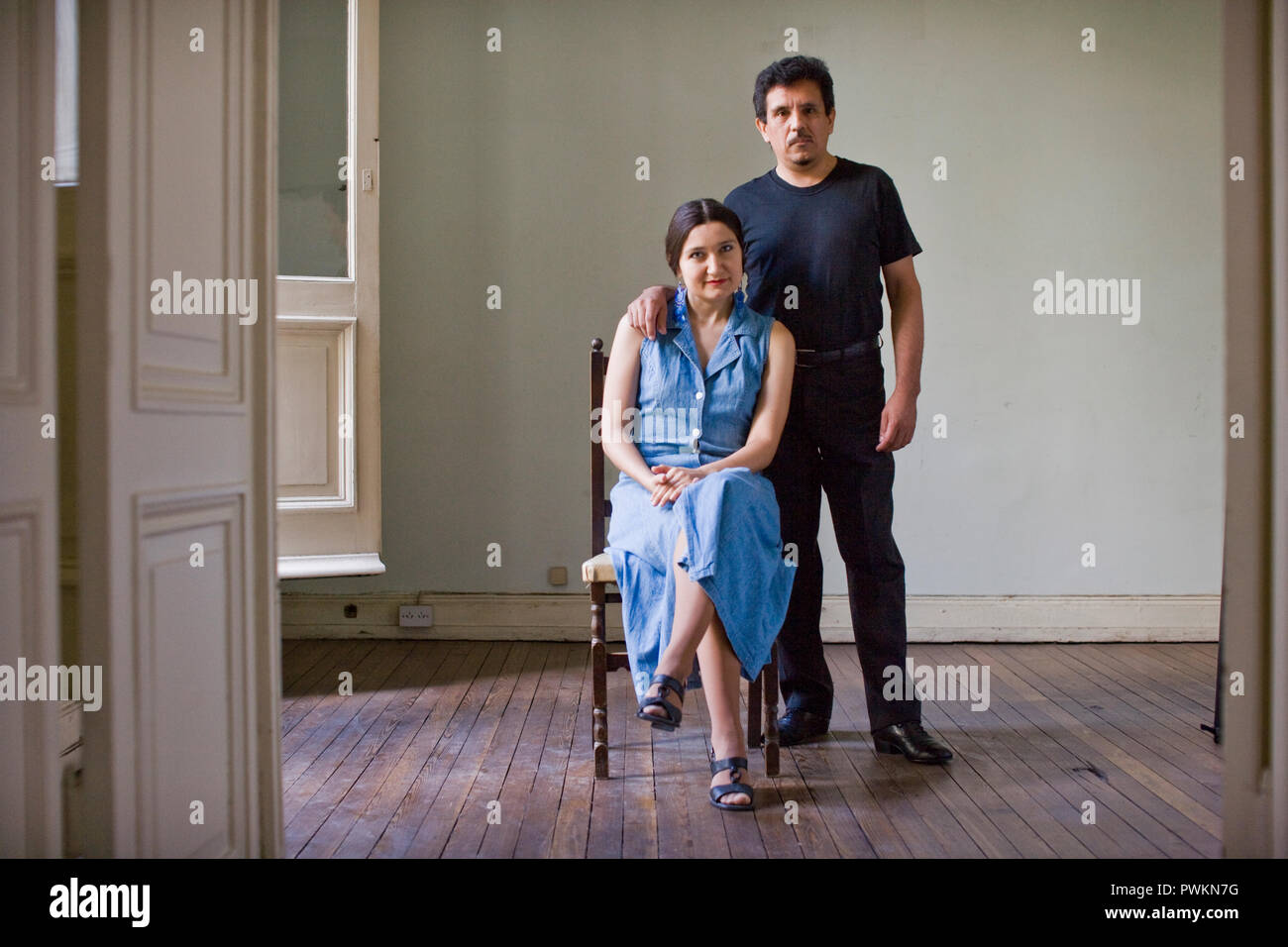 Couple home entrance arms hi-res stock photography and images - Alamy
