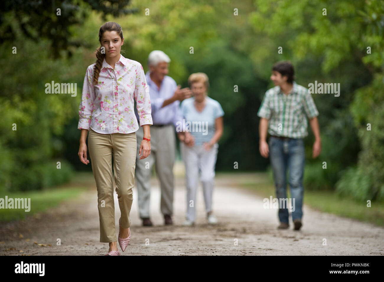 A family taking a walk Stock Photo - Alamy