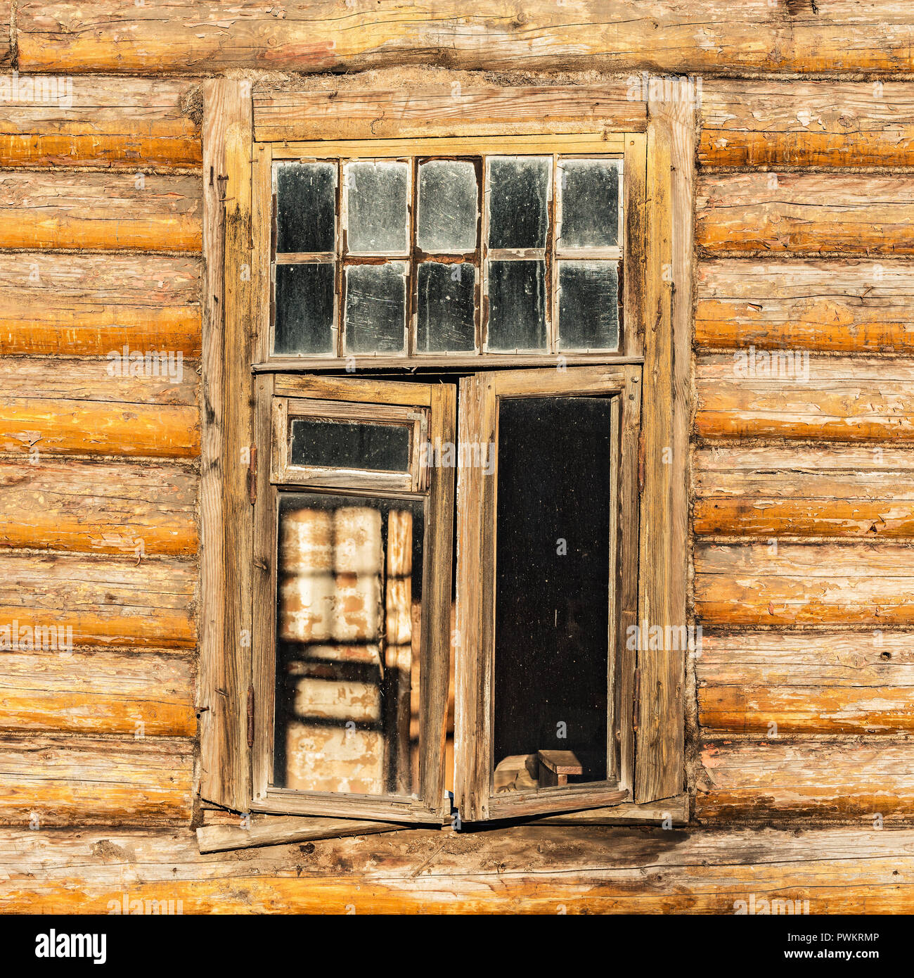 Broken vintage window in the wooden ancient wall Stock Photo - Alamy