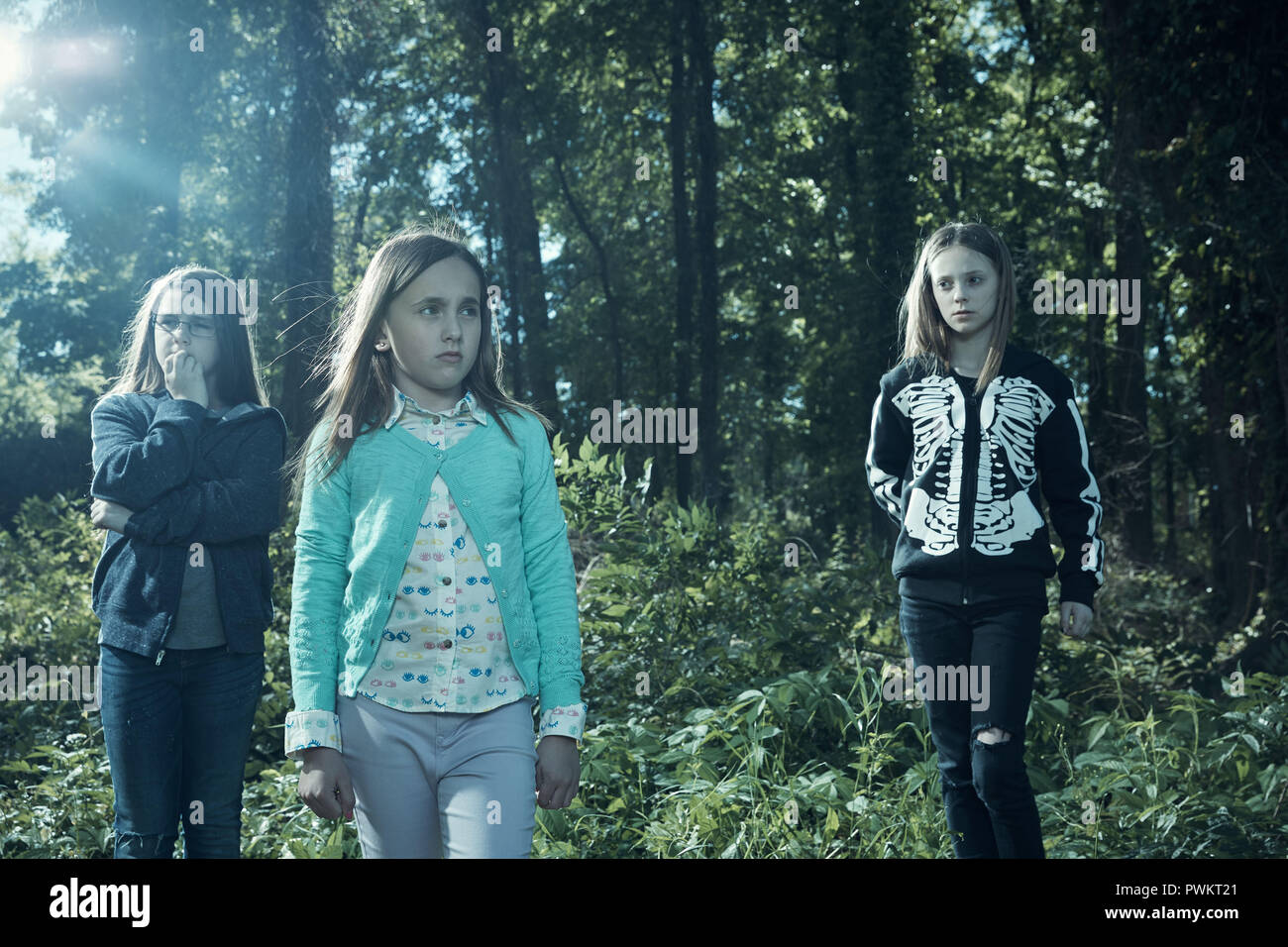 TERROR IN THE WOODS, from left: Ella West Jerrier, Skylar Morgan Jones ...