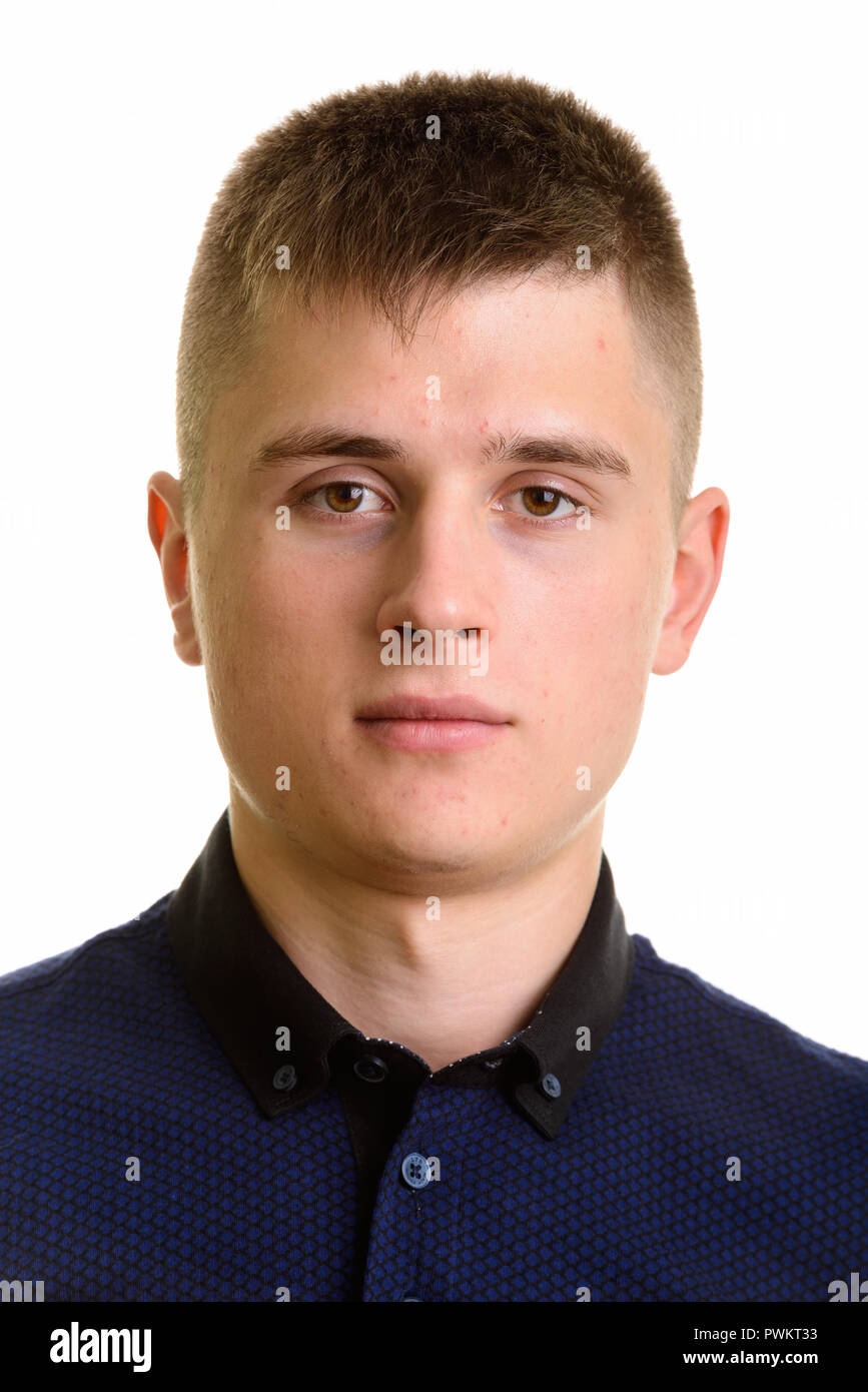 Portrait of young man face against white background Stock Photo - Alamy