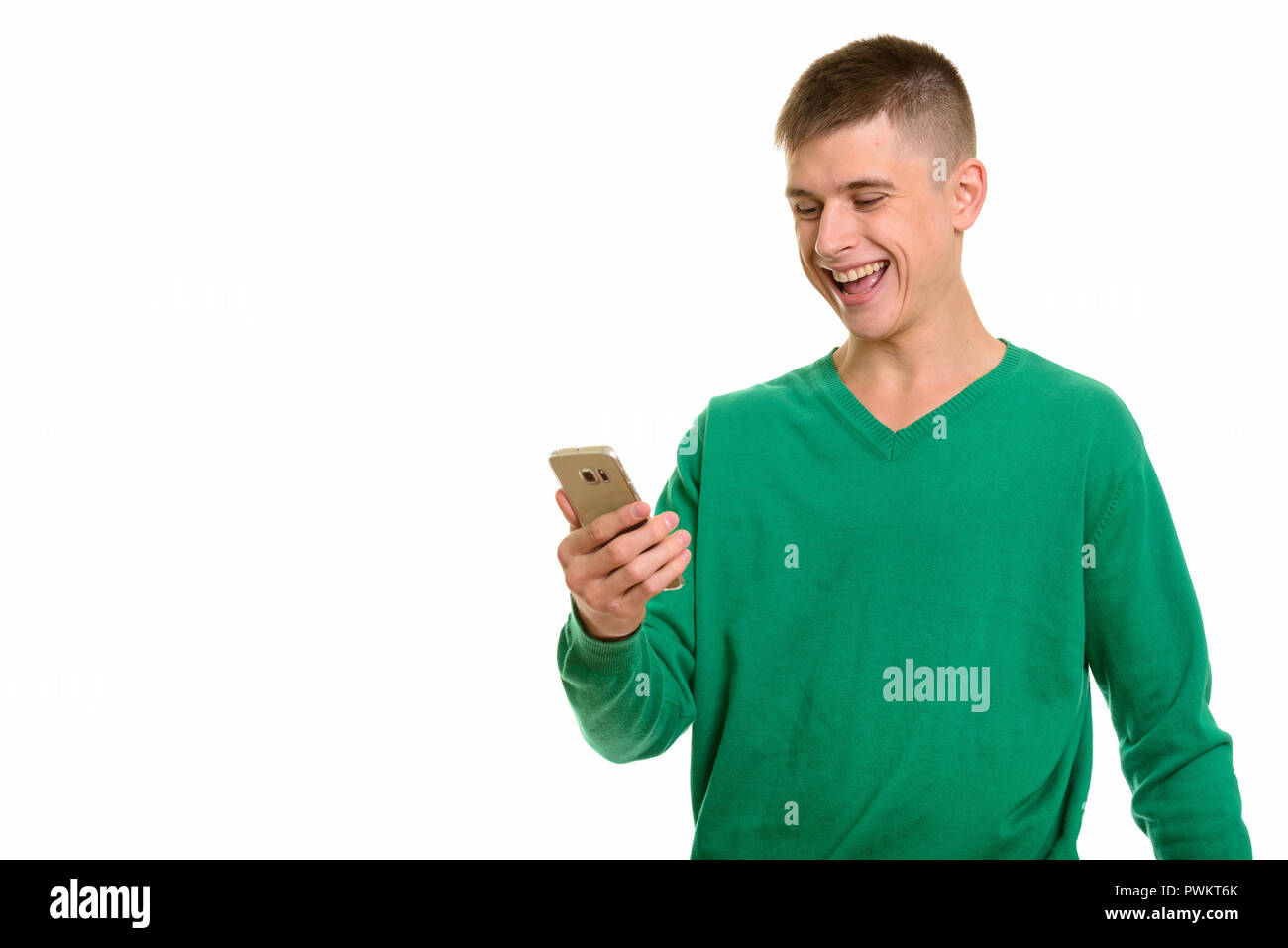 Happy man holding phone hi-res stock photography and images - Alamy