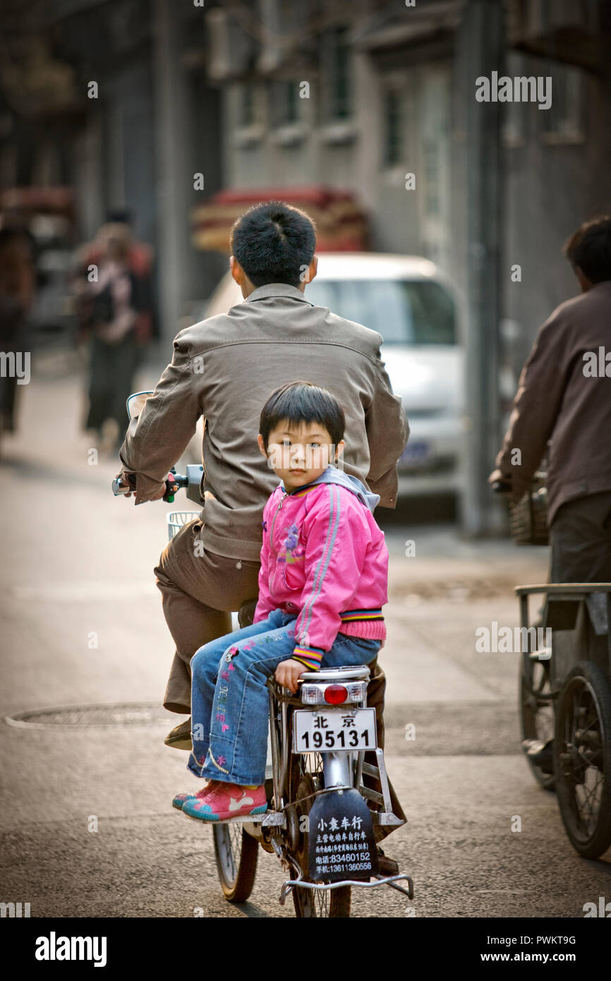 Chinese girls on bicycles hi-res stock photography and images - Alamy