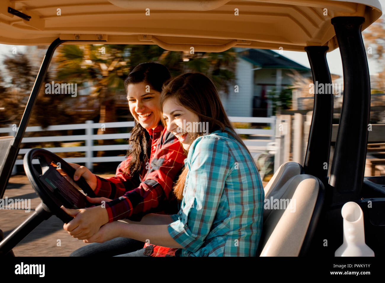 Two women messing around outdoors hi-res stock photography and images ...