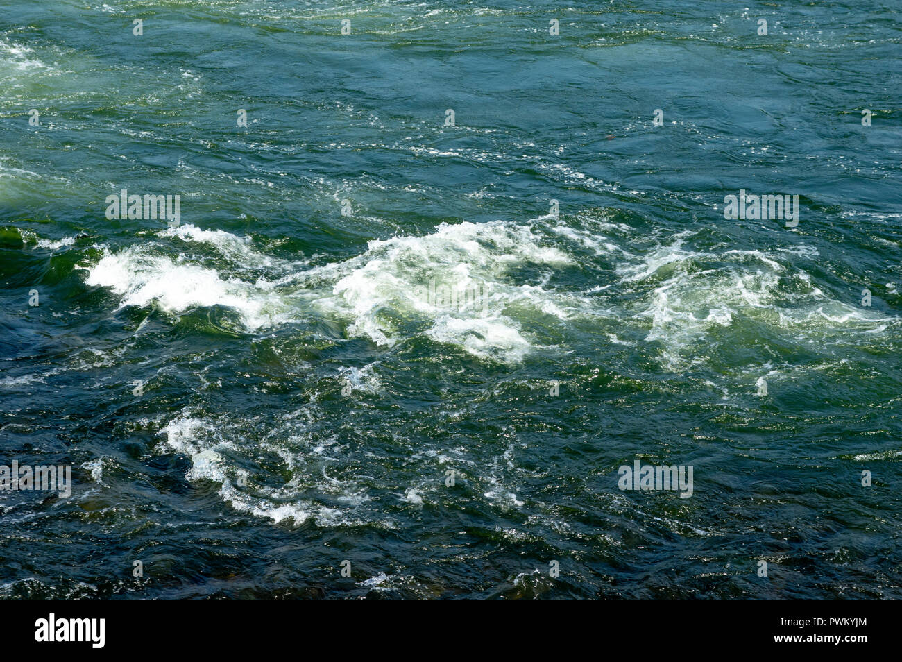 The beauty of a river flowing over rocks Stock Photo - Alamy