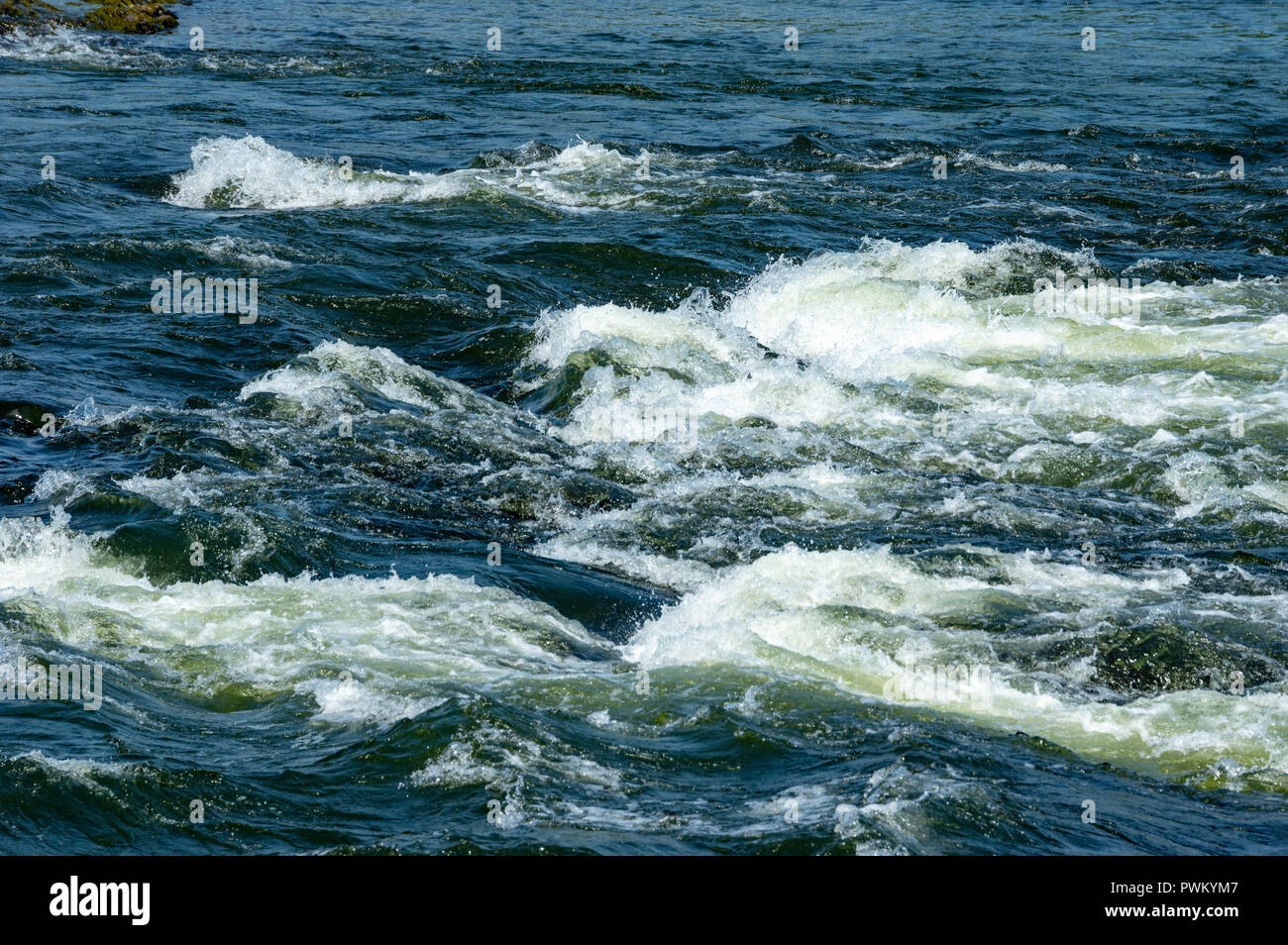 The beauty of a river flowing over rocks Stock Photo - Alamy