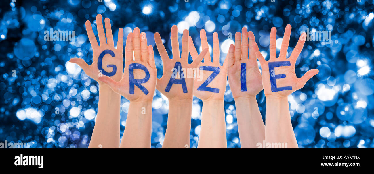 Hands Building Grazie Means Thank You, Sparkling Bokeh Background Stock ...