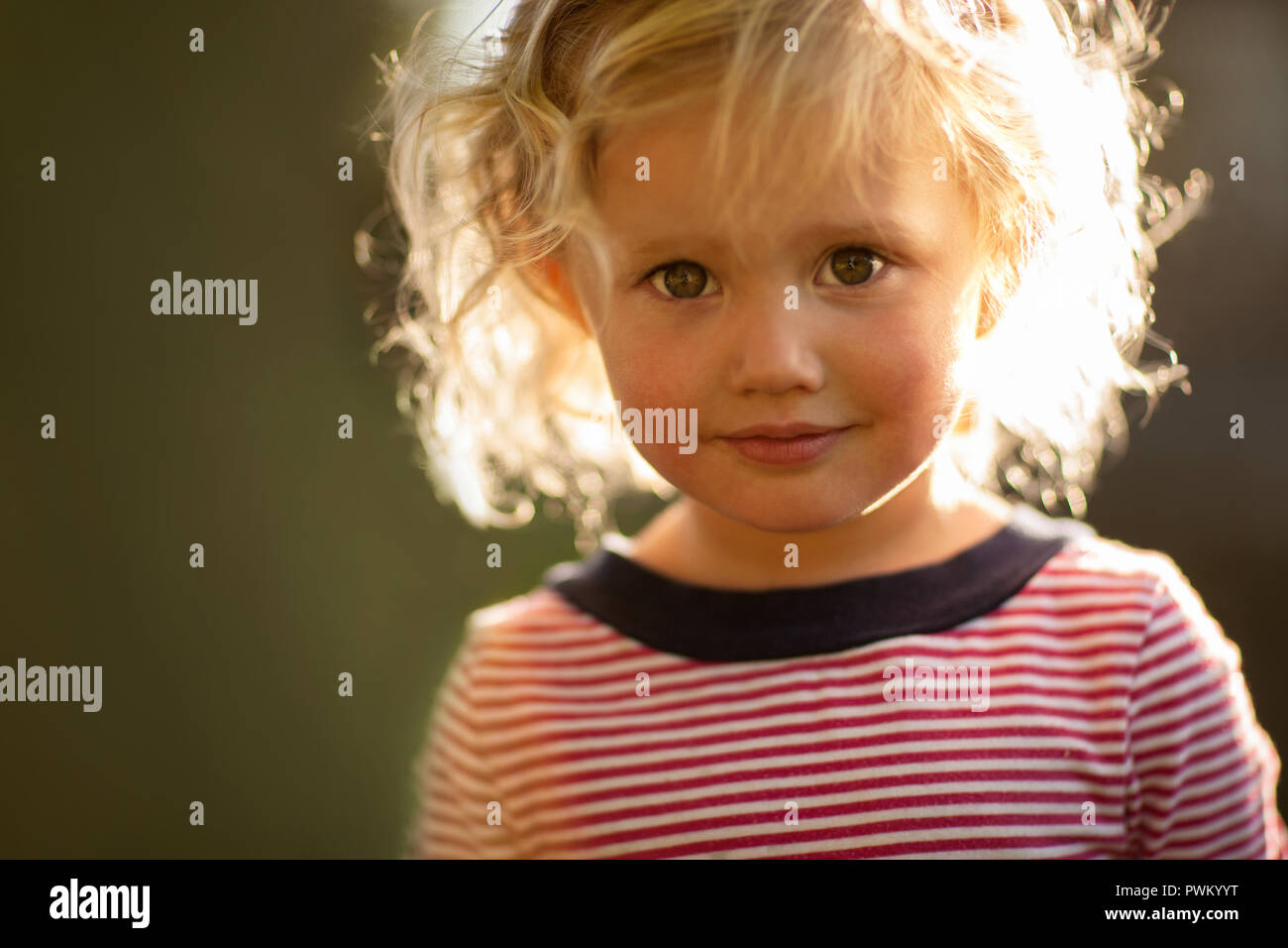 Portrait of a young girl in the sunlight Stock Photo - Alamy
