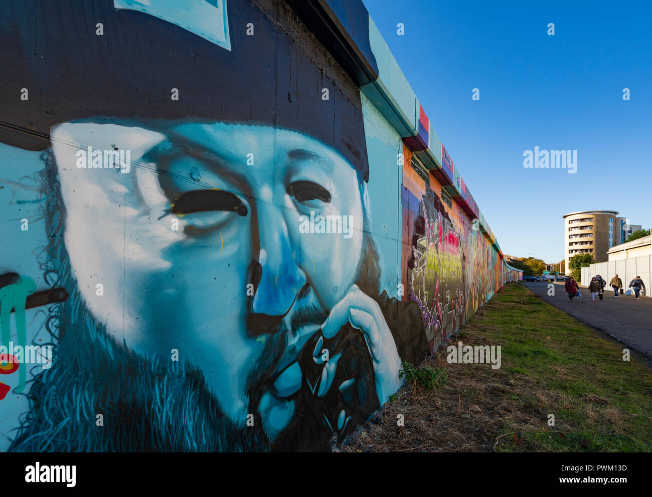 View of murals painted on wall at Marine Parade Graffiti Wall in Leith ...