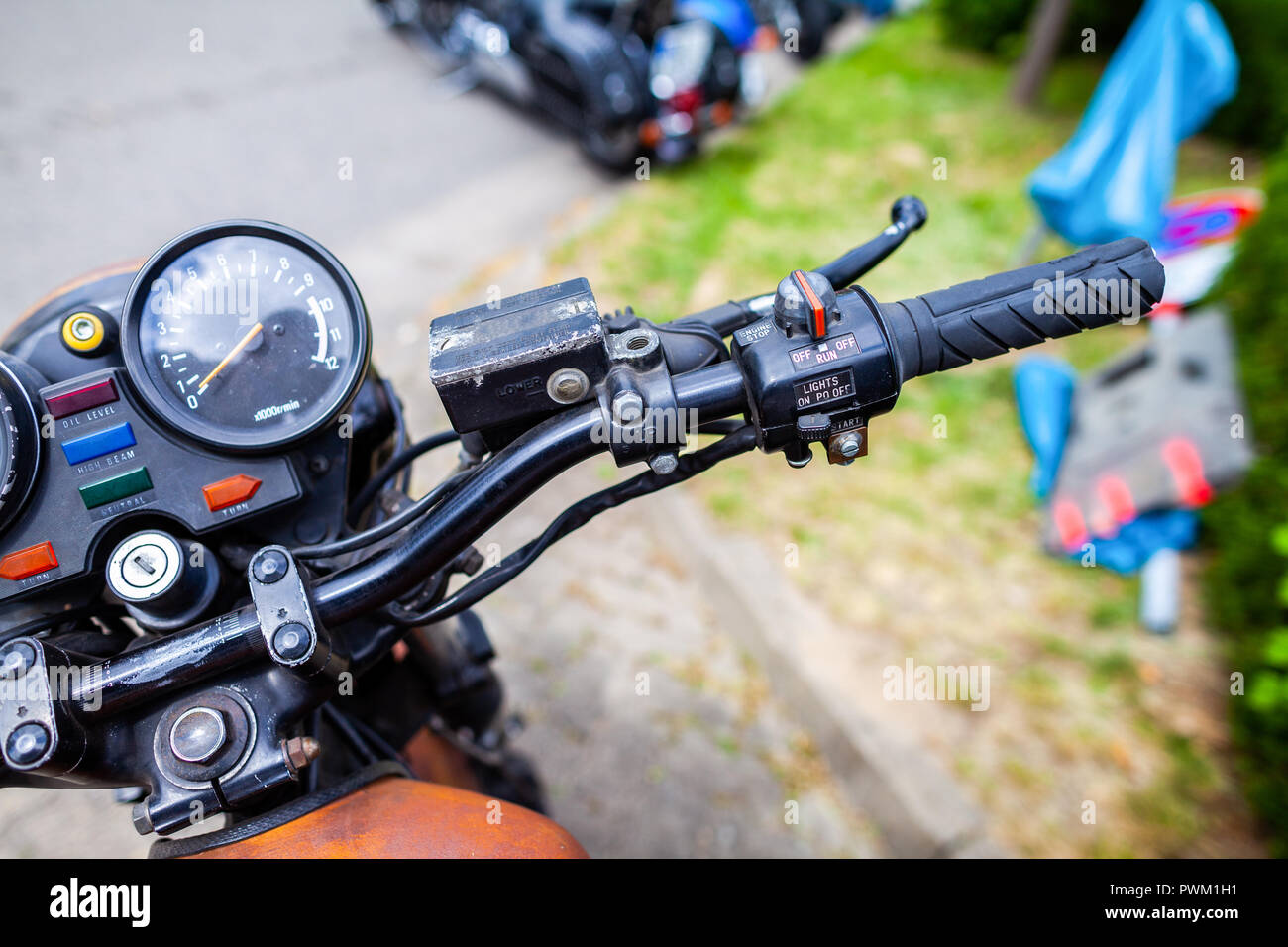 Classic handlebar on an old motorbike at street Stock Photo - Alamy