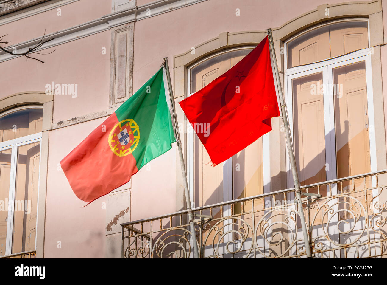 Faro, Portugal - May 1, 2018: Portuguese flag and communist party flag ...