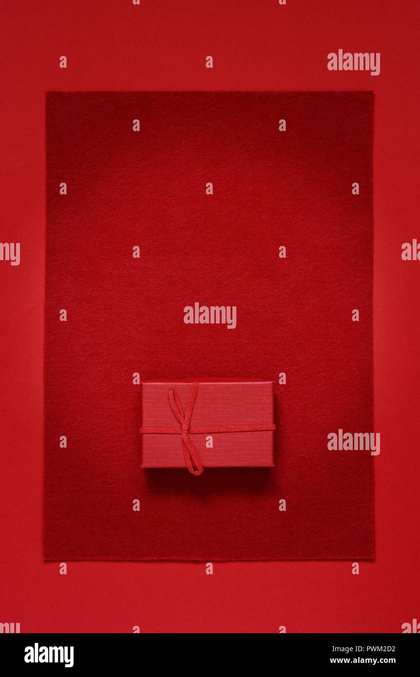 Red gift box on a red background. Romantic gift for Valentine's day ...