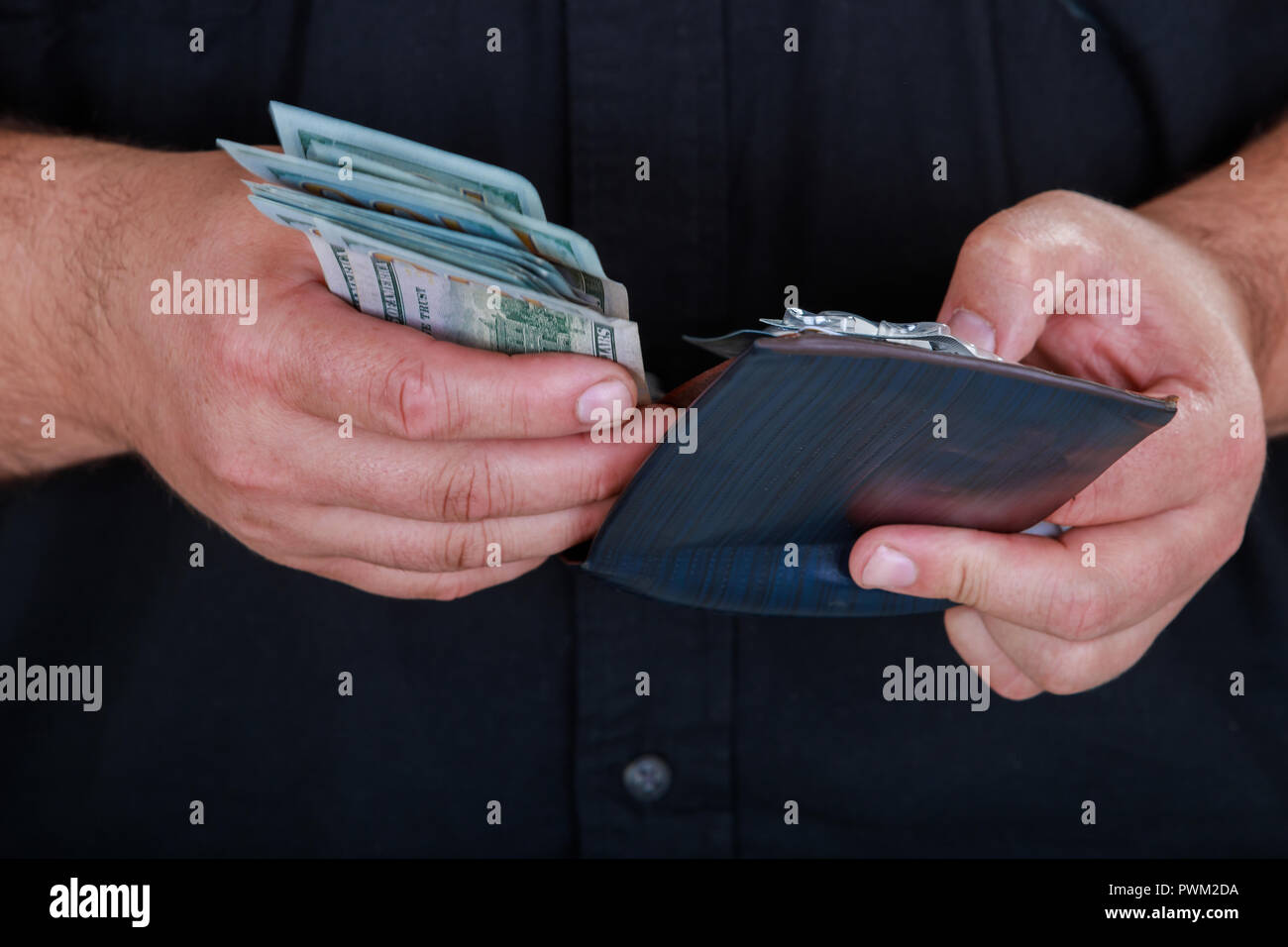 Close up of man counting hi-res stock photography and images - Alamy