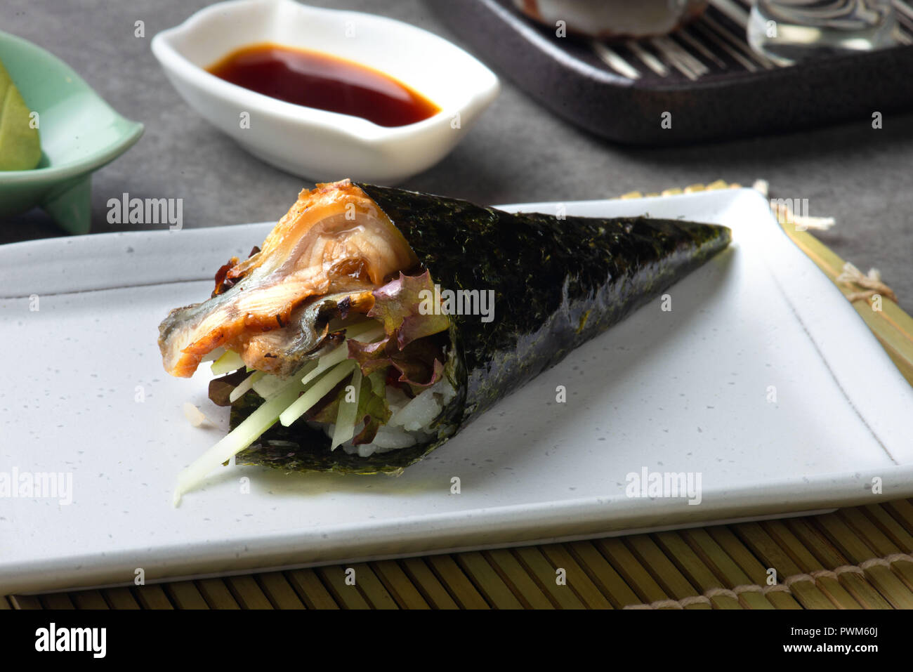 Temaki Unagi sushi with eel and rice Stock Photo - Alamy