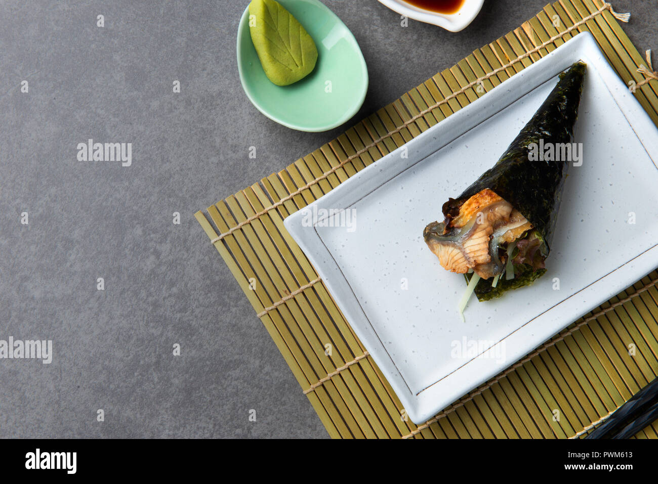 Temaki Unagi sushi with eel and rice Stock Photo - Alamy
