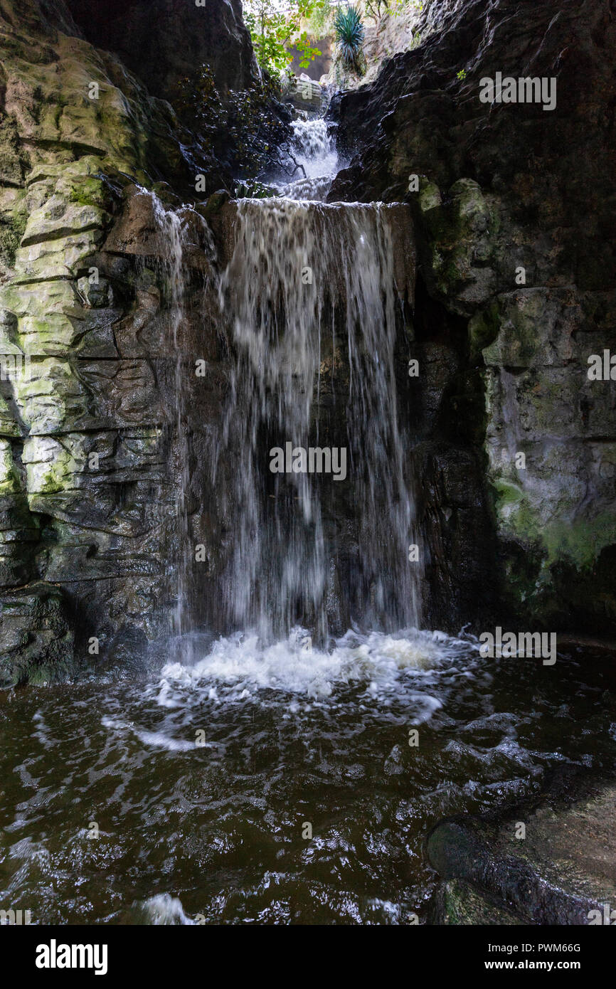 Waterfall at Buttes-Chaumont Park - Parc des Buttes-Chaumont is one of ...