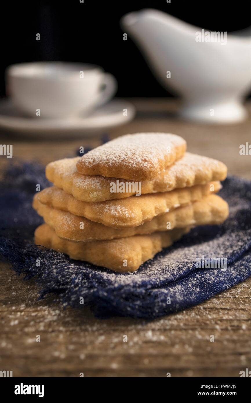 Homemade biscuits with icing sugar to be served with coffee Stock Photo ...
