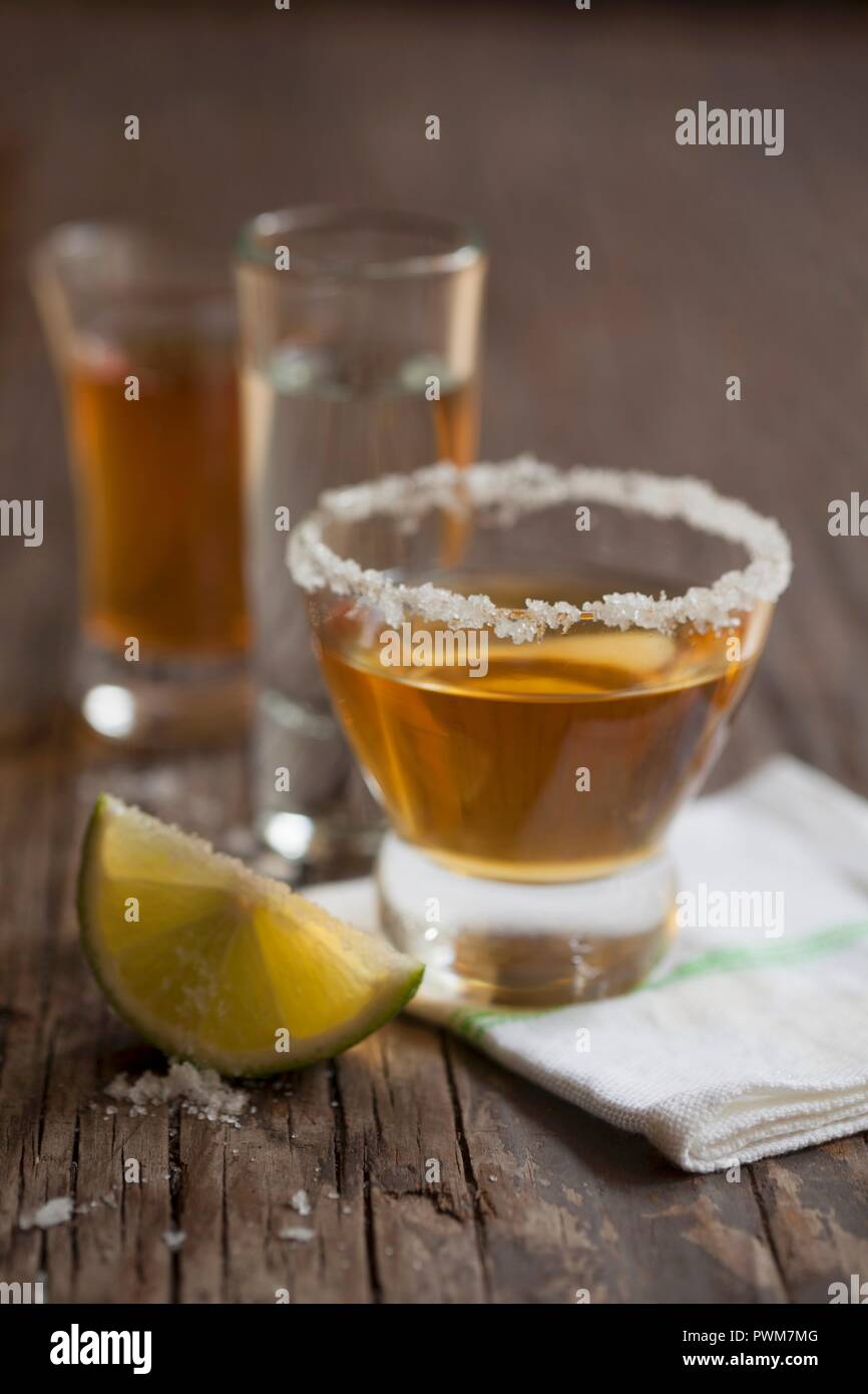 Tequilla shots: blanco, joven and reposado Stock Photo - Alamy