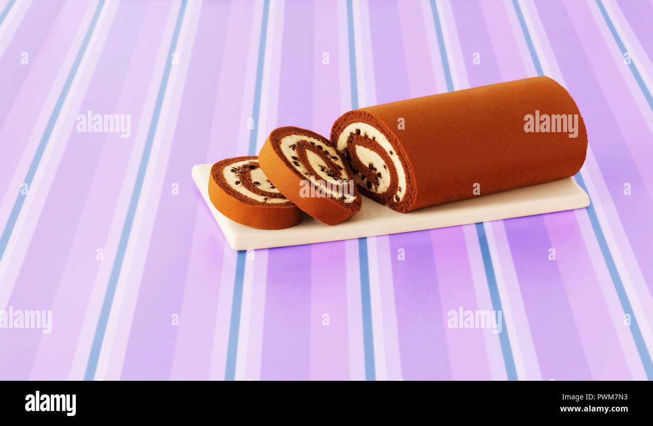 Chocolate Arctic roll, sliced Stock Photo - Alamy