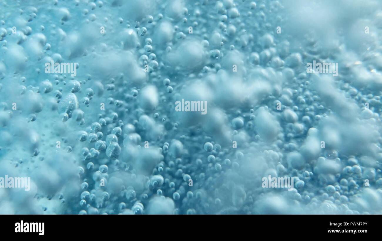 Close up shot of air bubbles taken underwater symbolising the essence ...