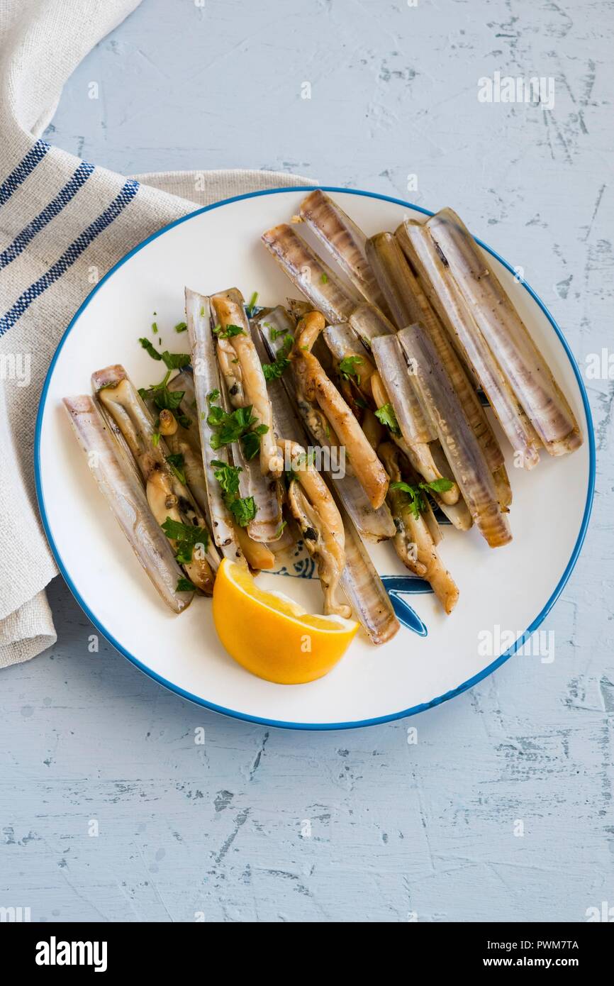 Grilled Grooved Razor Shell Stock Photo - Alamy