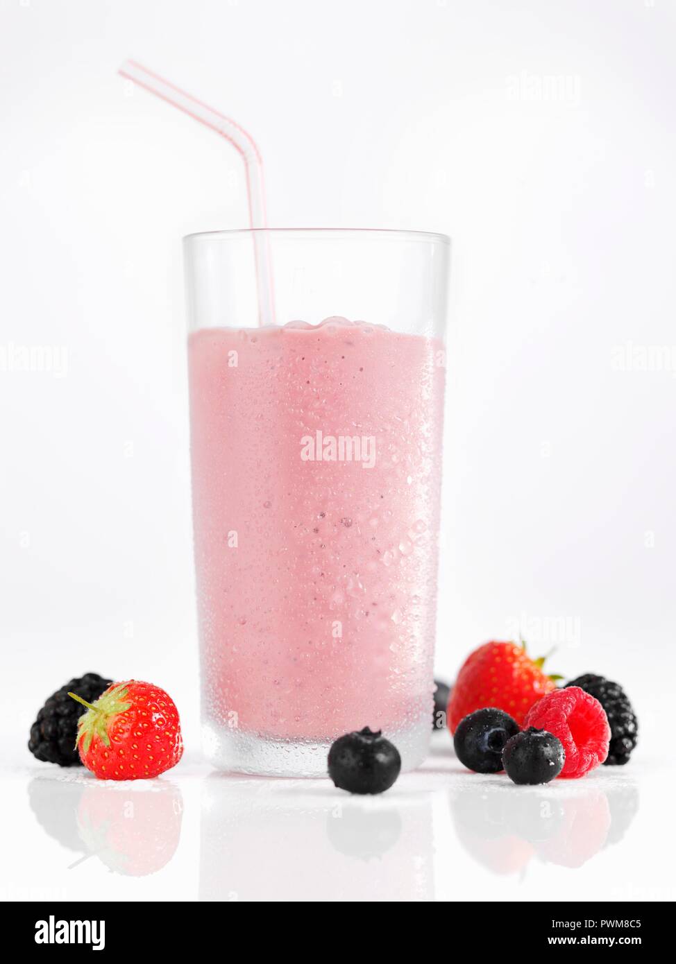 Milkshake with berries Stock Photo - Alamy