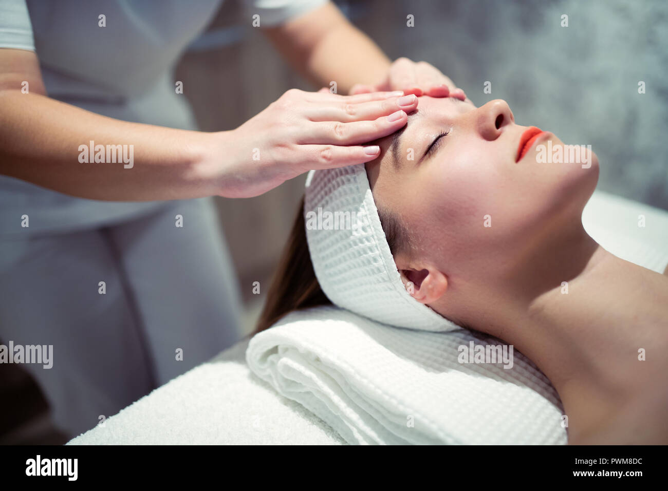 Facial massage treatment by professional Stock Photo - Alamy