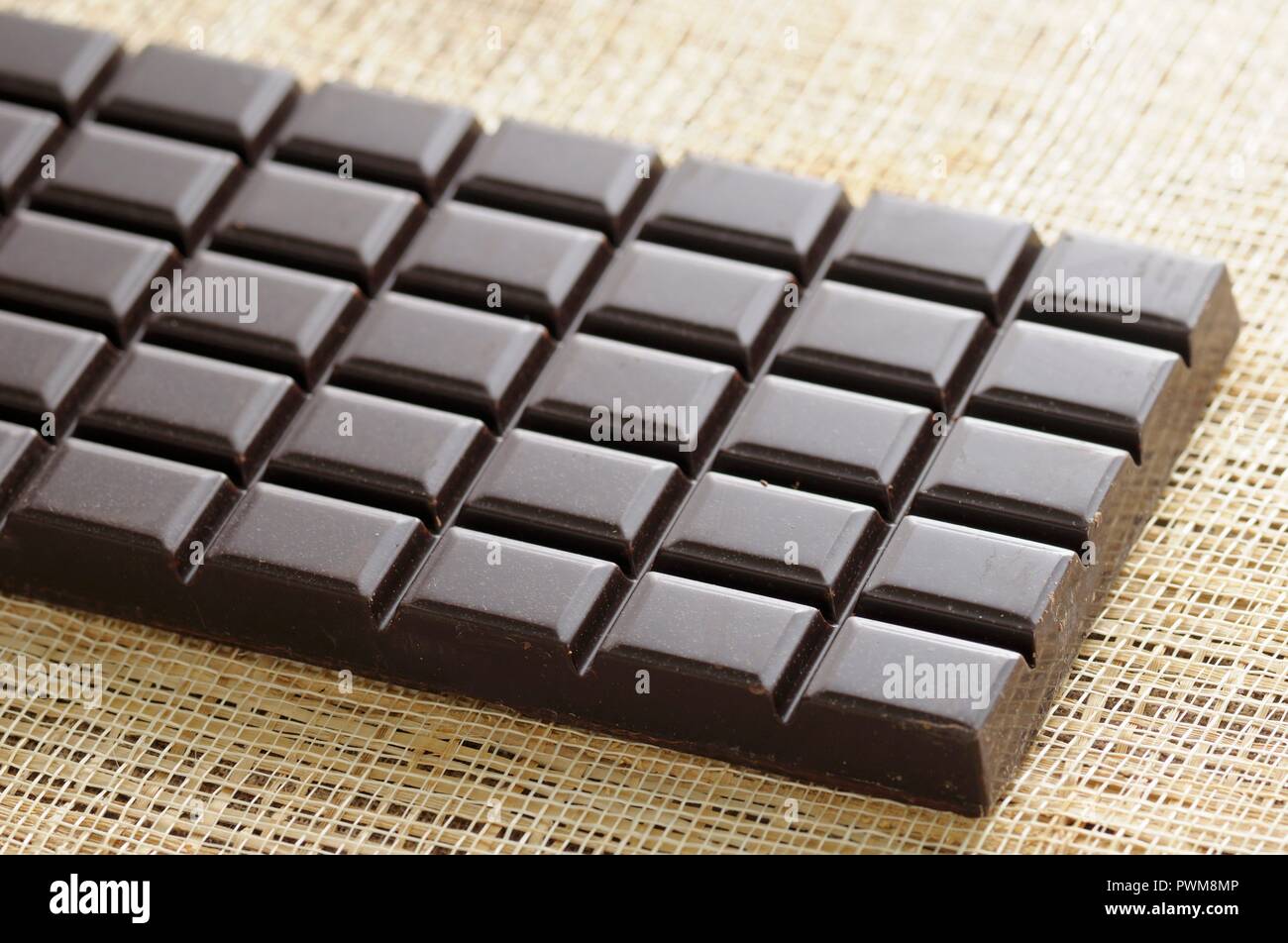 A bar of dark chocolate Stock Photo - Alamy