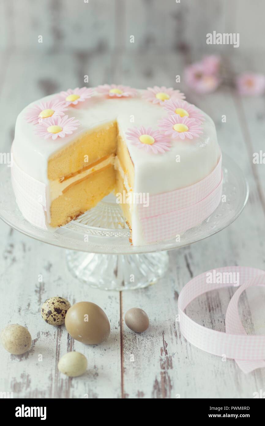 Easter cake with pink fondant flowers Stock Photo - Alamy