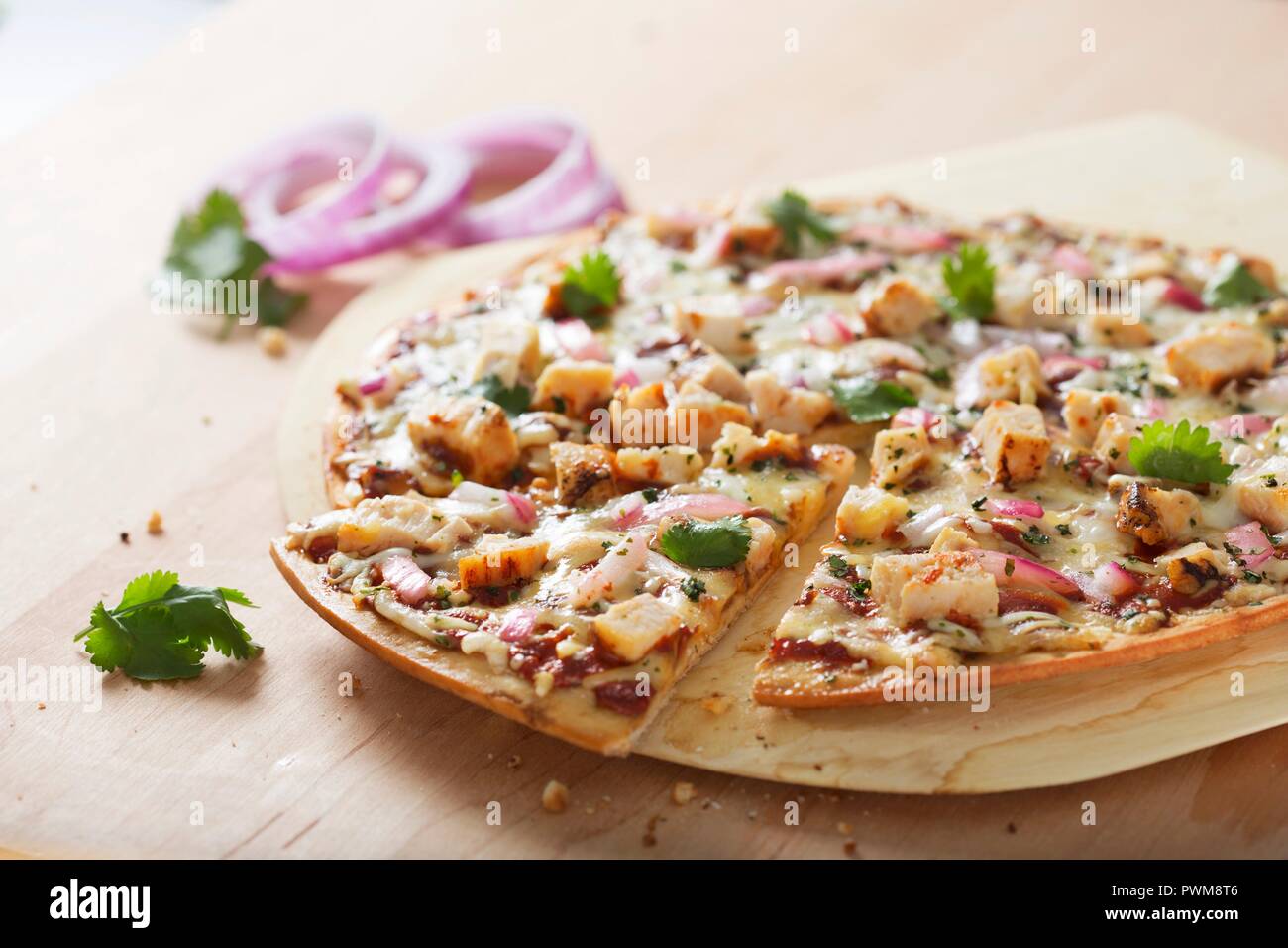 Barbecue Chicken Pizza with Red Onion and Cilantro Stock Photo - Alamy
