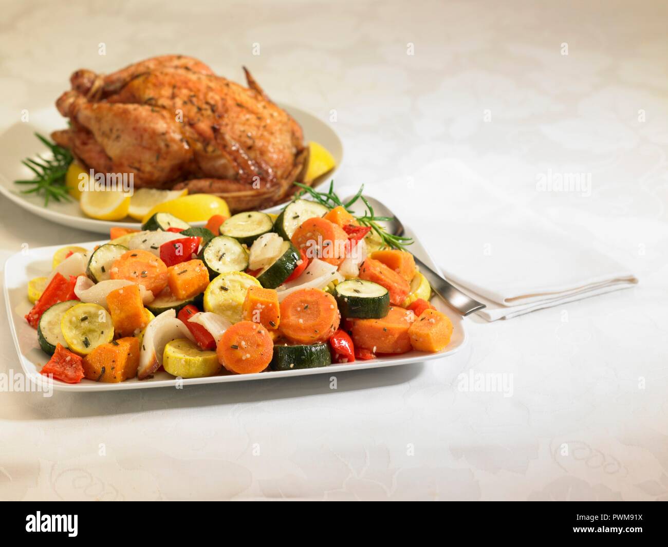 Roast chicken and vegetable platters Stock Photo - Alamy