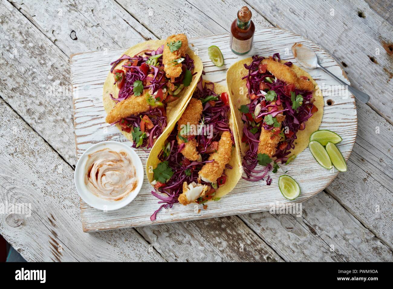 Fish tacos with red cabbage Stock Photo - Alamy