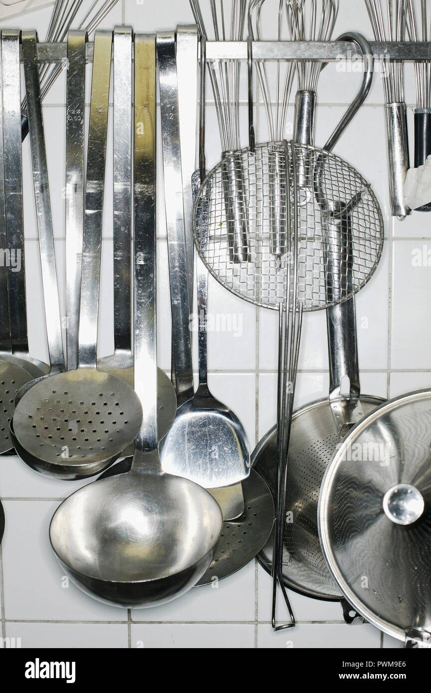 Various utensils suspended hi-res stock photography and images - Alamy