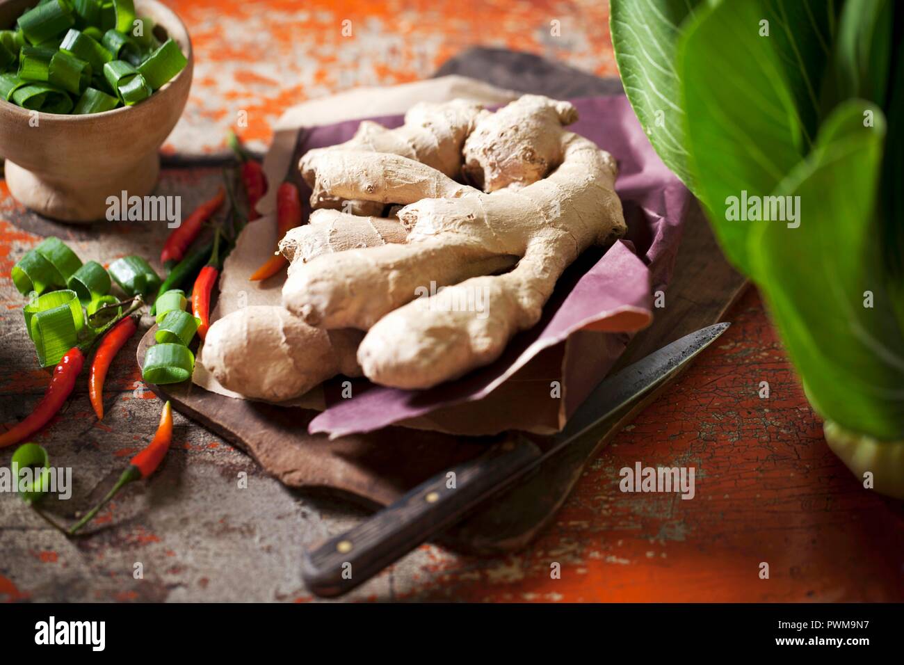 Root ginger, chilli peppers and bok choy Stock Photo - Alamy