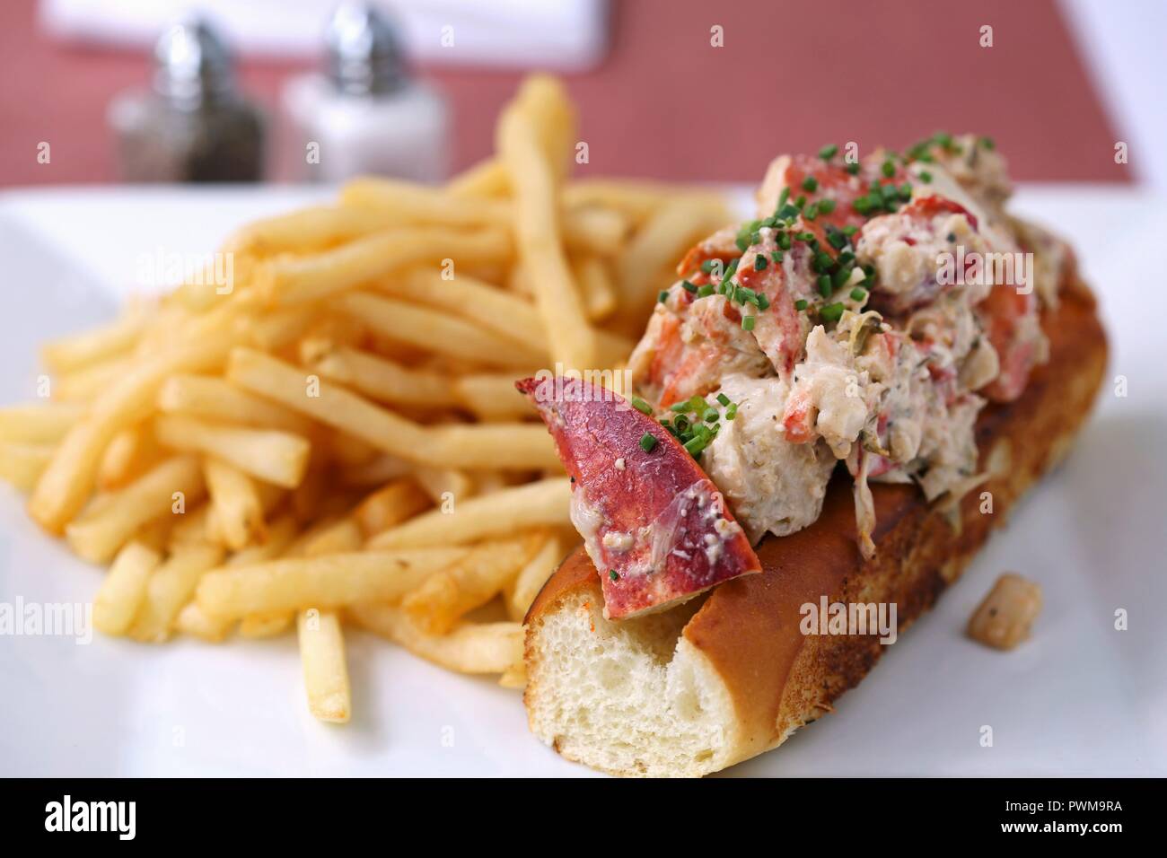 Lobster roll with french fries Stock Photo - Alamy