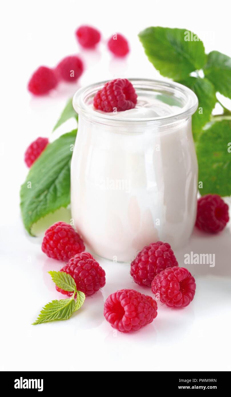 Organic yogurt with raspberries Stock Photo - Alamy