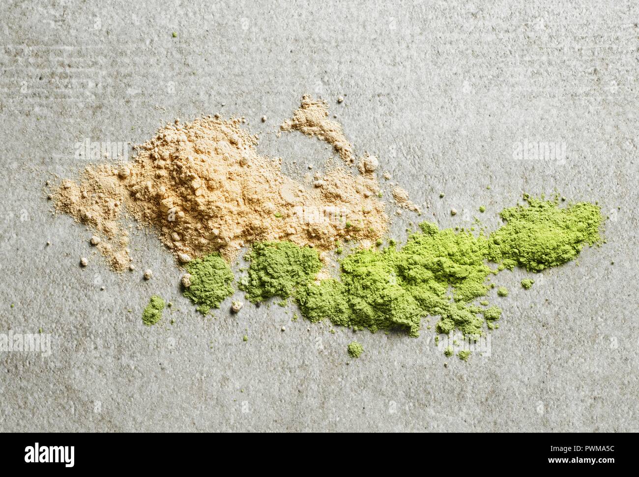 A pile of maca powder and barley sprouts powder (seen from above Stock ...
