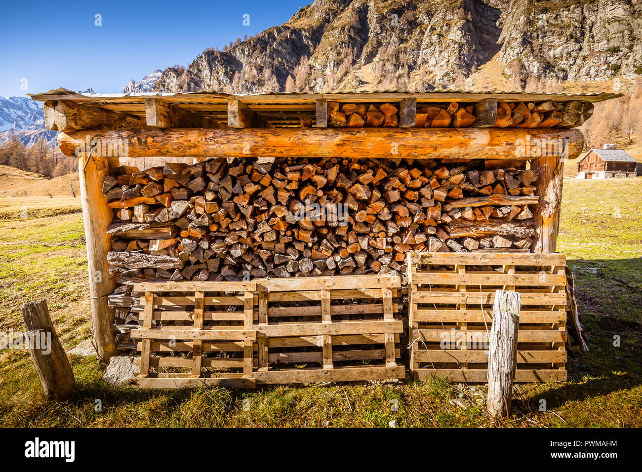 firewood storage in a beautiful mountain landscape - autumn season ...