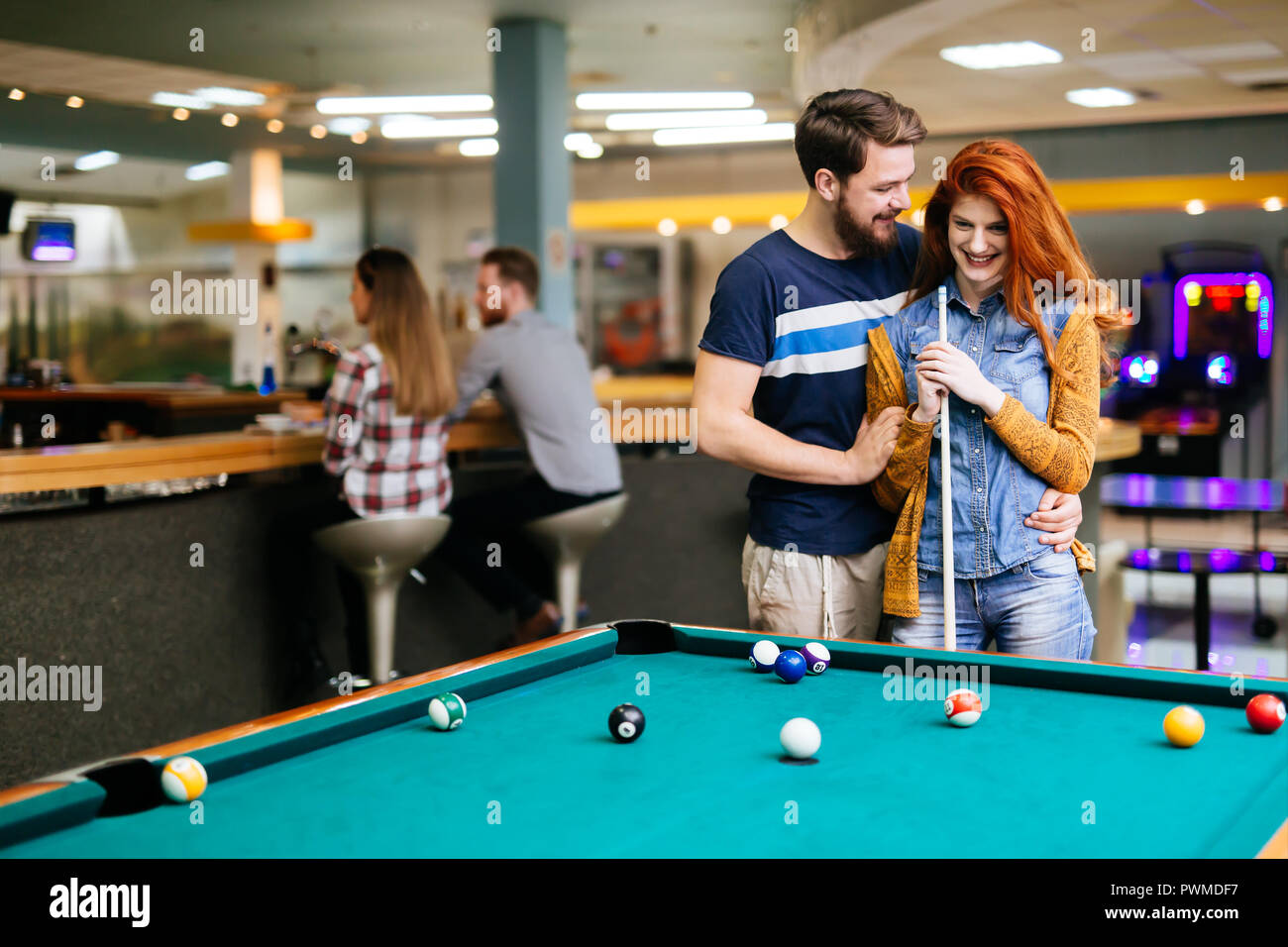 Couple at pool table hi-res stock photography and images - Alamy