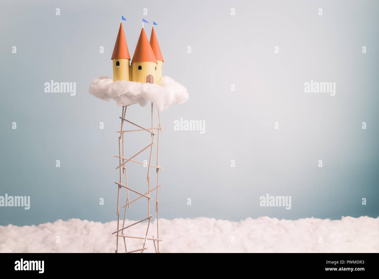 Bird like castle above the clouds on a weak wooden tower Stock Photo ...