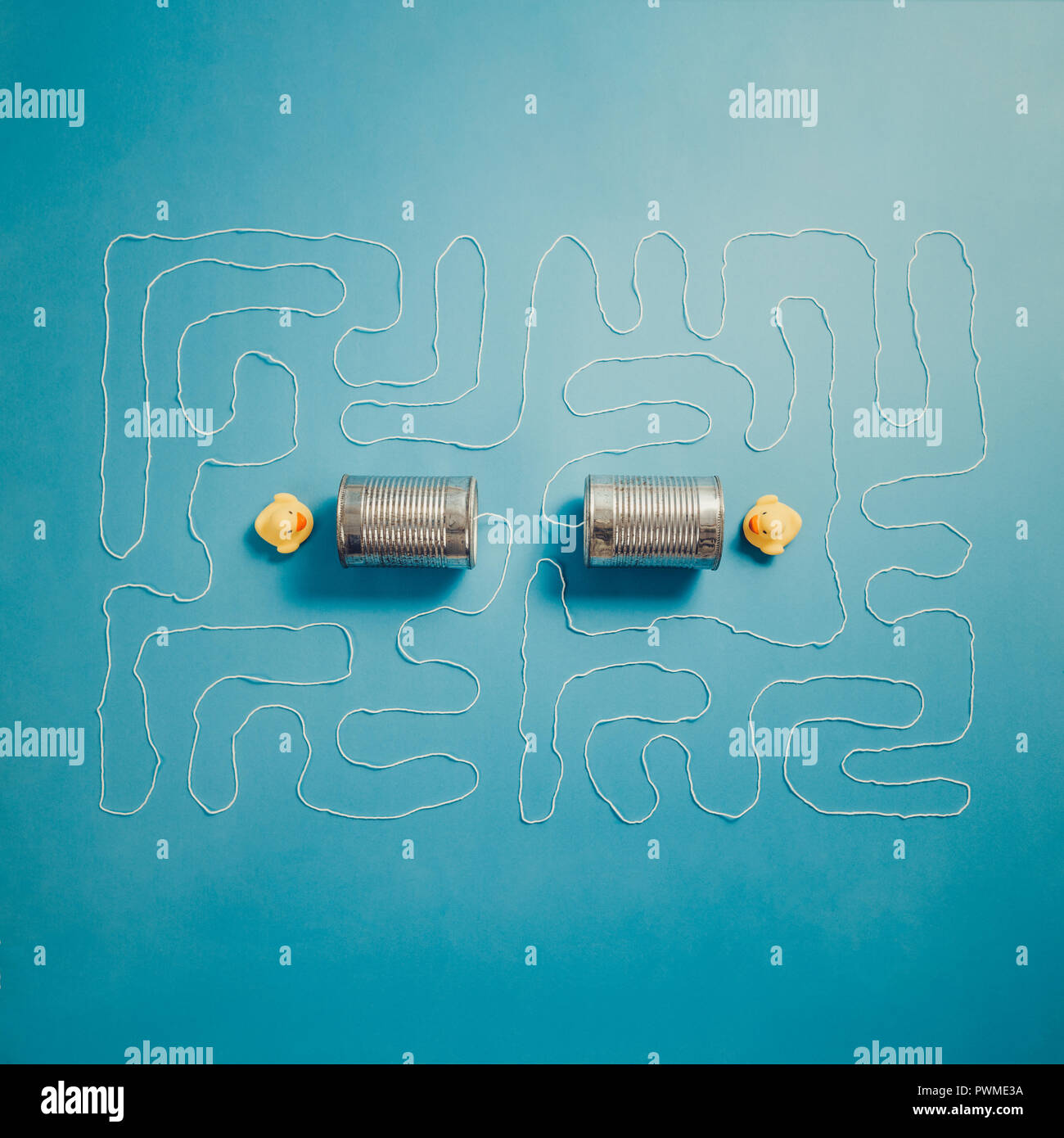 Two yellow rubber duck talking with an encrypted call. Symbolized by a ...