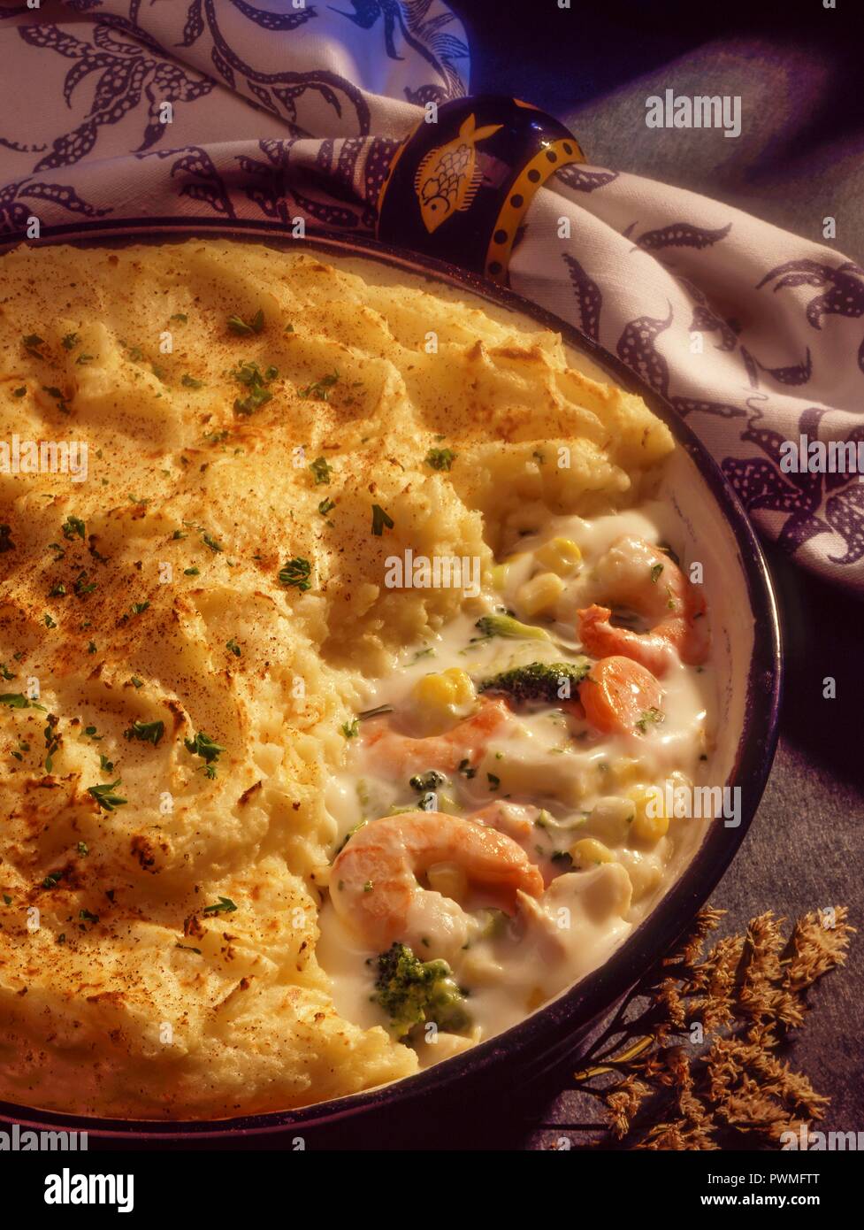 Creamy prawn bake with sweetcorn, carrots, broccoli and a potato ...