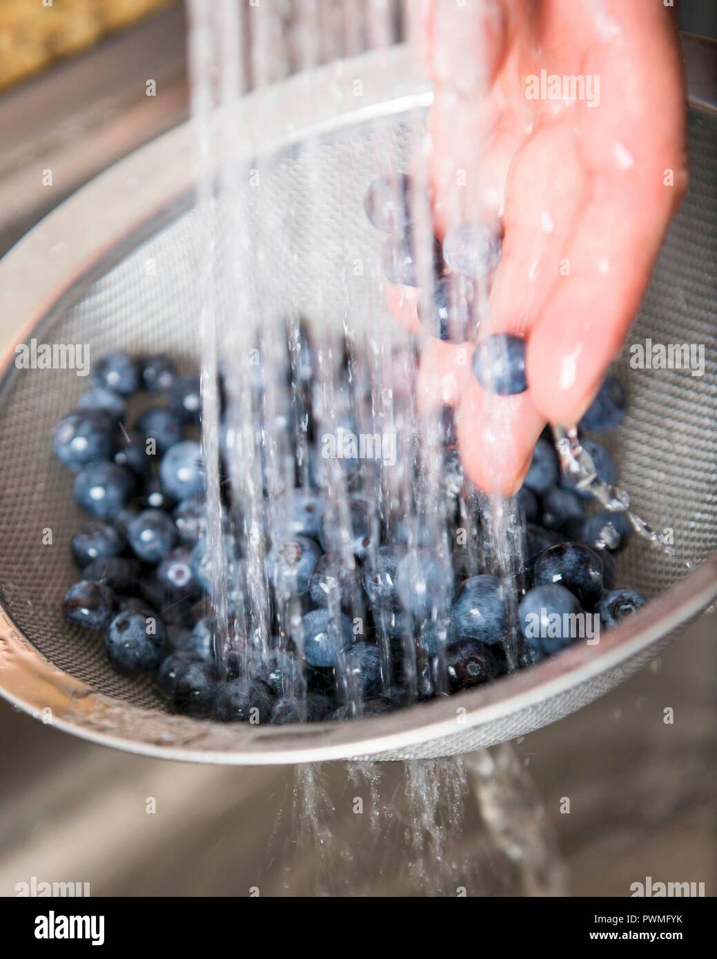 Washing blueberries hi-res stock photography and images - Alamy