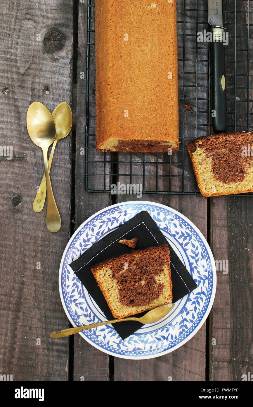 Marble cake, a slice cut Stock Photo - Alamy