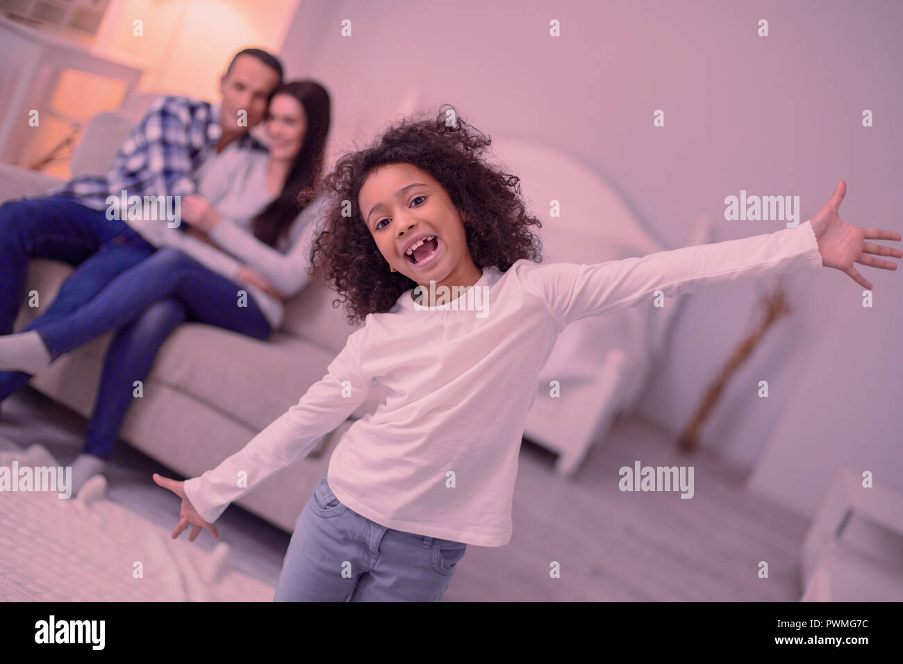 Positive joyful girl enjoying time at home Stock Photo - Alamy