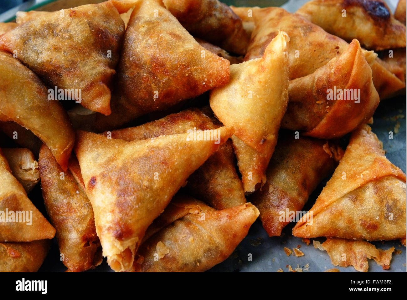 samoosa is a fried or baked pastry with a savoury filling Stock Photo ...